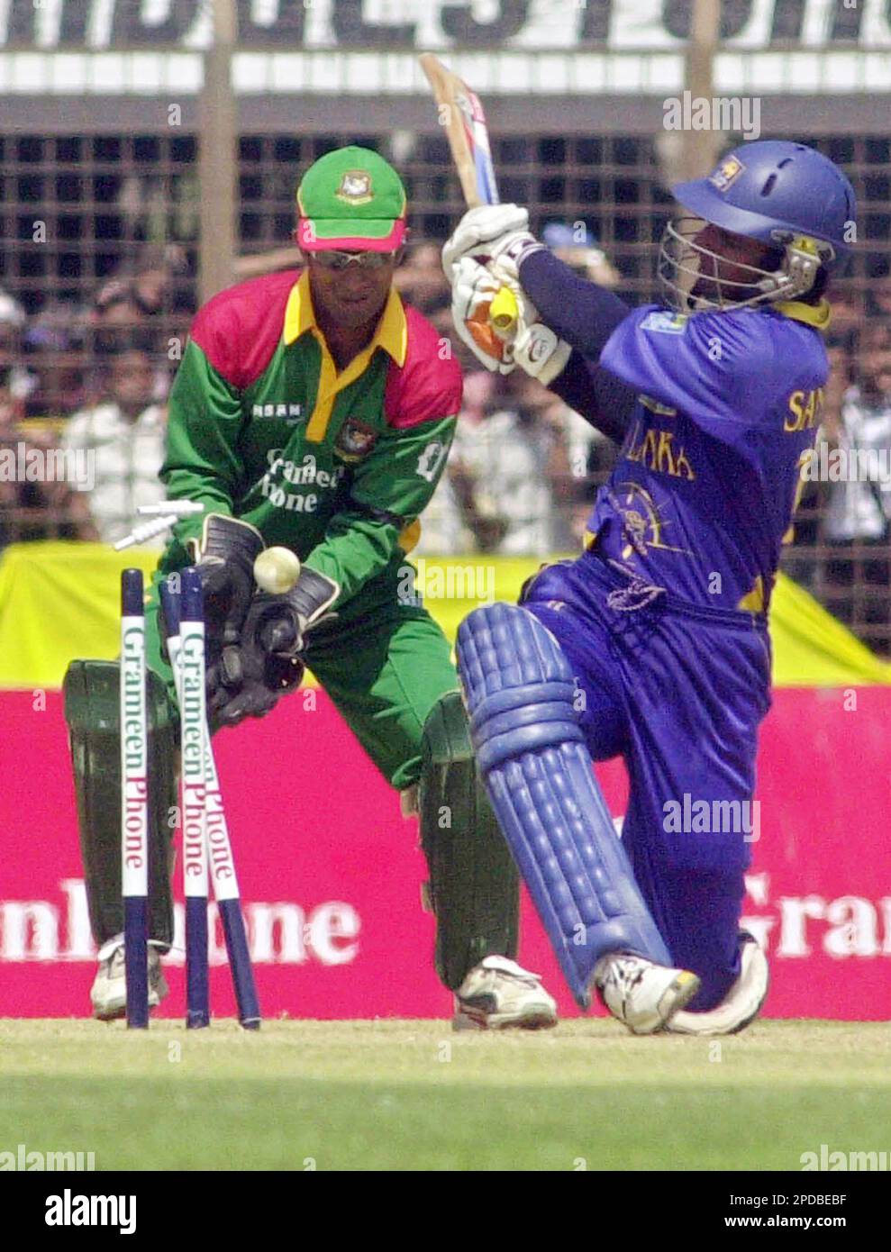 Bangladesh's Mohammed Rafique, unseen, bowls Sri Lanka's Kumar ...
