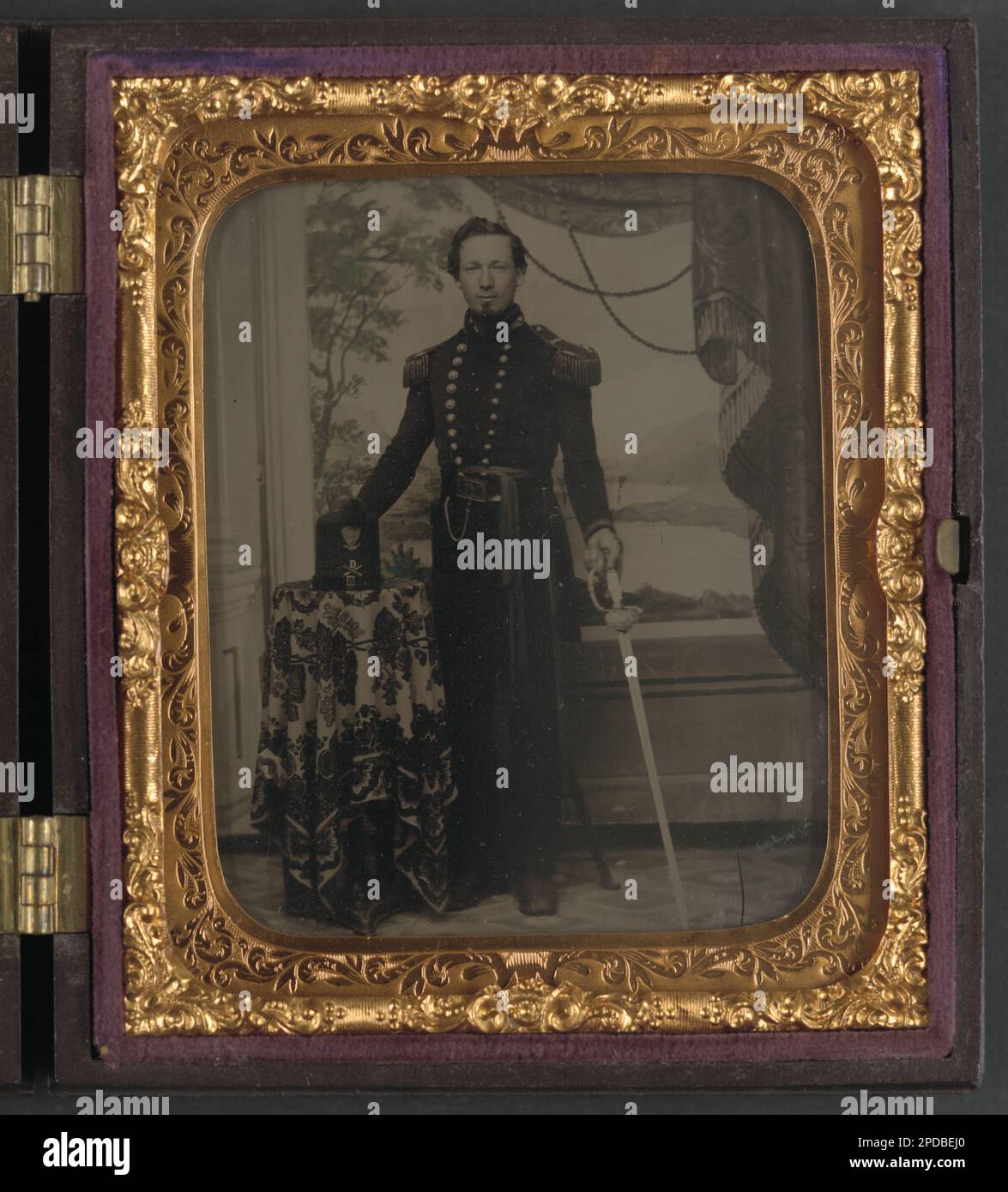 Unidentified soldier in Union uniform holding sword, with Company D ...