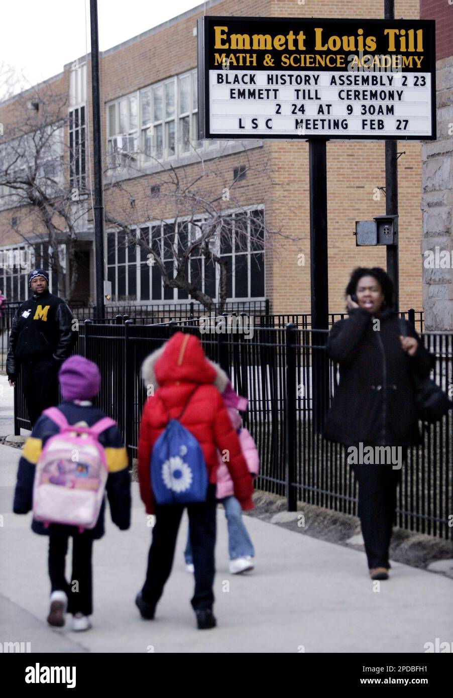 Students at the former James McCosh Elementary Schoool walk past a new ...