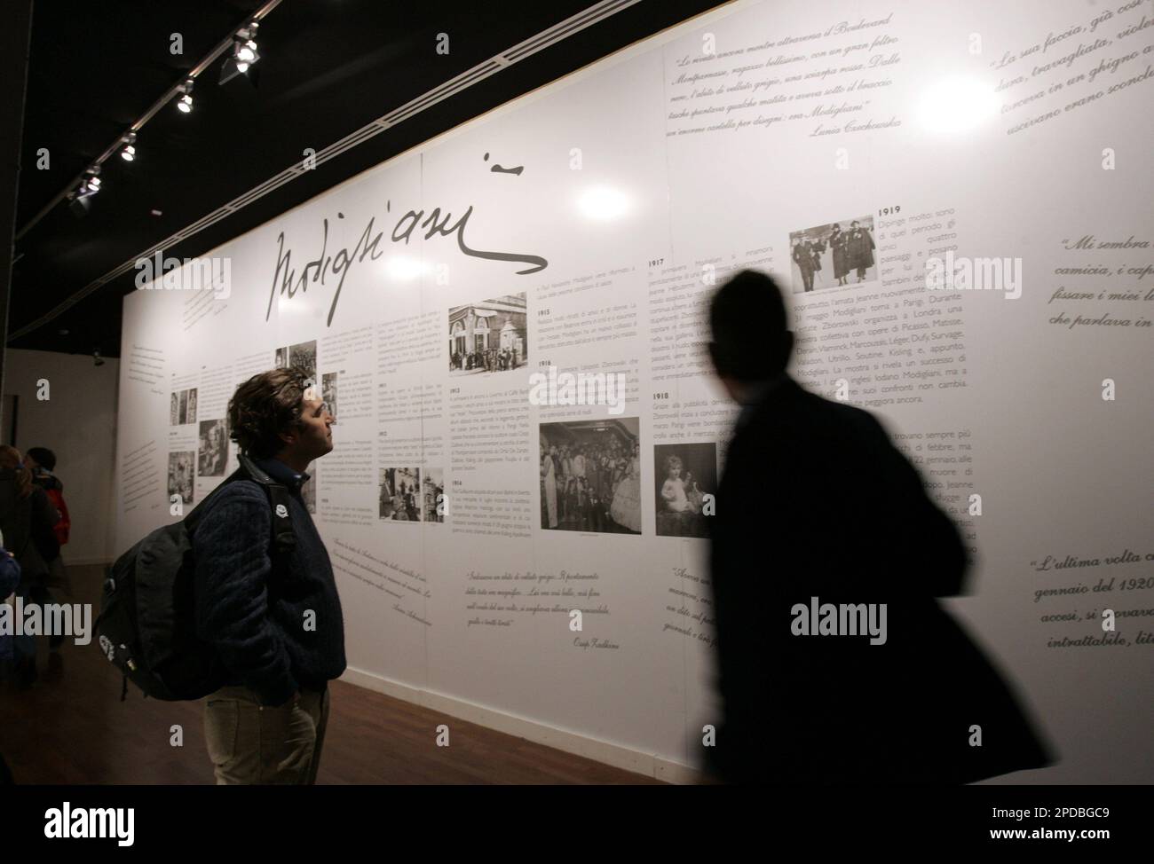 A visitor looks at Italian painter and scultor Amedeo Modigliani's ...