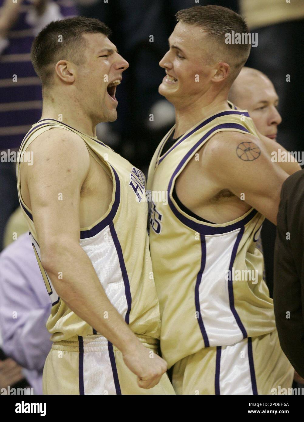 In college basketball action, Washington forward Mike Jensen (42 ...