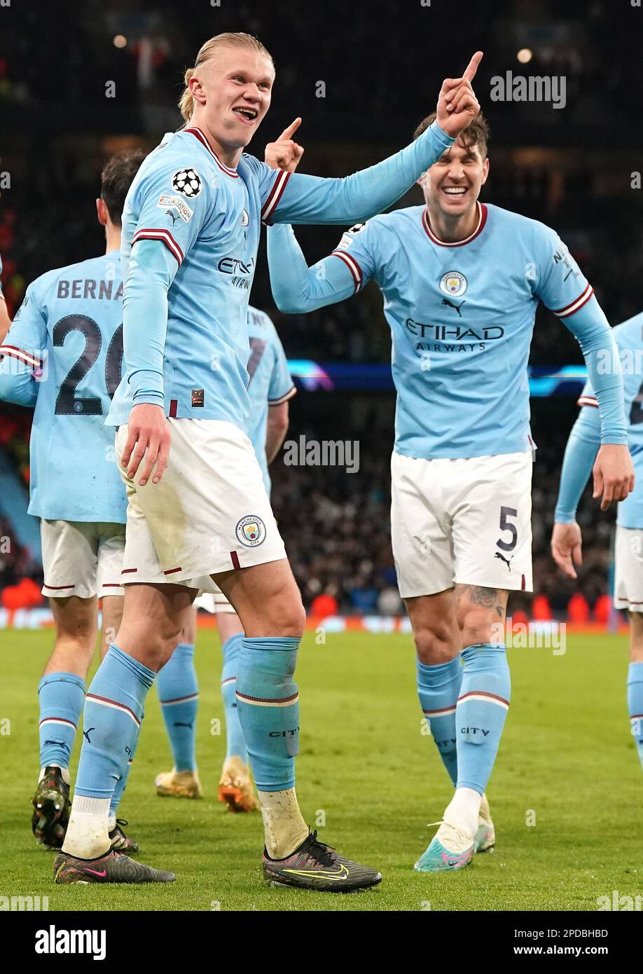 Manchester City's Erling Haaland (left) celebrates scoring their side's ...
