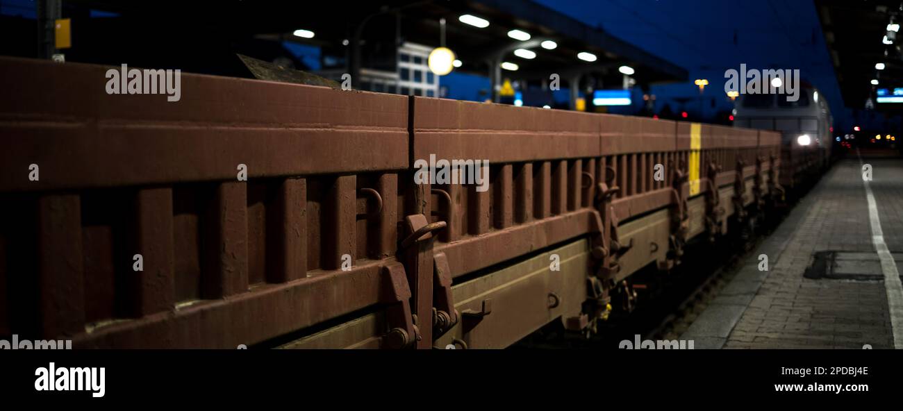 a rail network working train at night panorama Stock Photo - Alamy