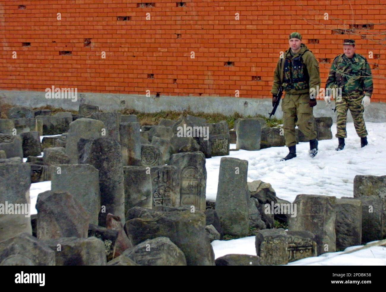 Russian special forces patrol at a cemetery, a memorial to the Stalin ...