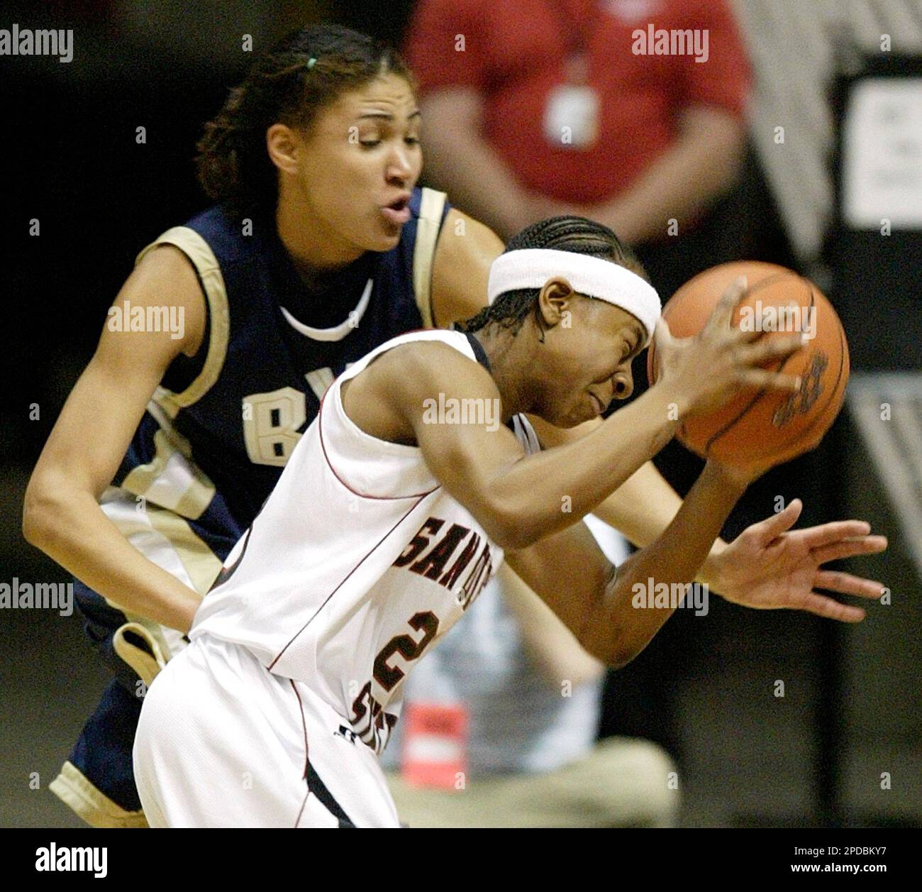 San Diego State's Lasandra Dixon pulls the ball away from Brigham Young ...