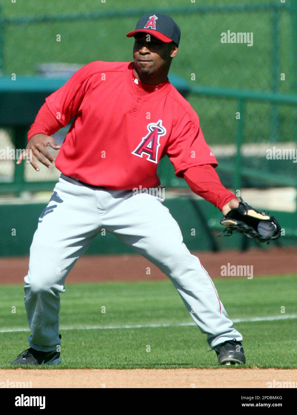Los Angeles Angels infielder Chone Figgins catches a line drive off the ...
