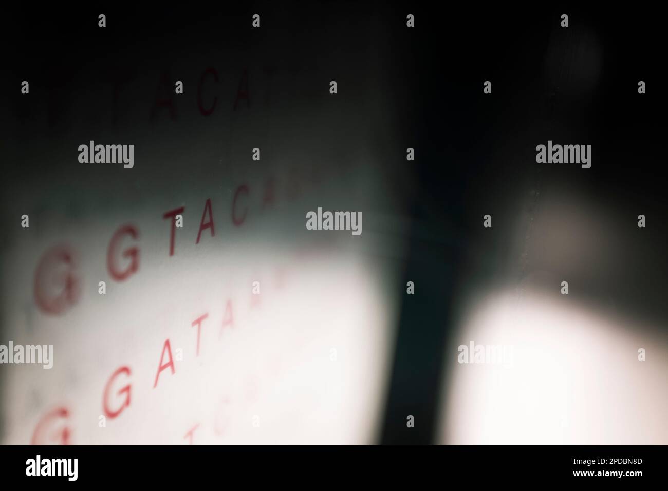 Red and black capital letters on a white board surface Stock Photo - Alamy