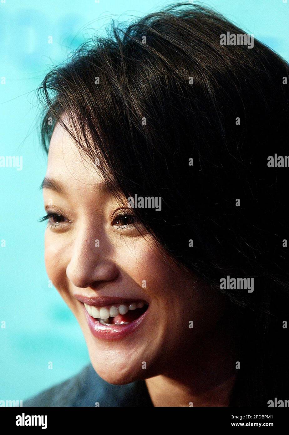 Mainland Chinese actress Zhou Xun smiles at a prize presentation ...