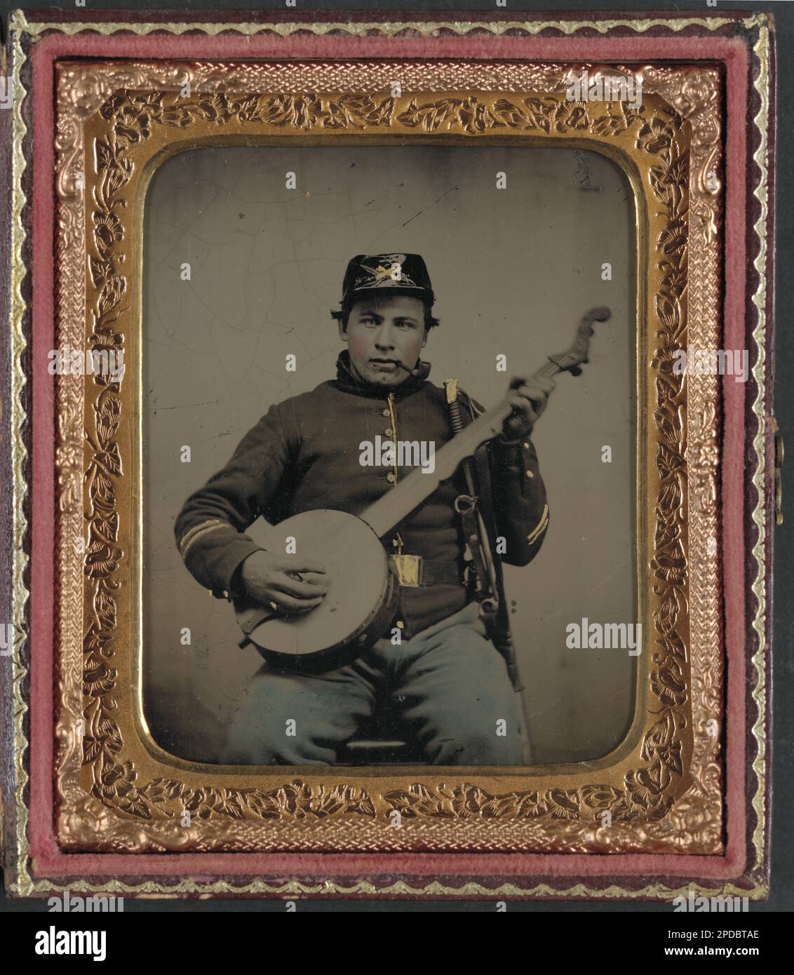 Unidentified soldier in Union cavalry uniform with banjo, sword, and ...