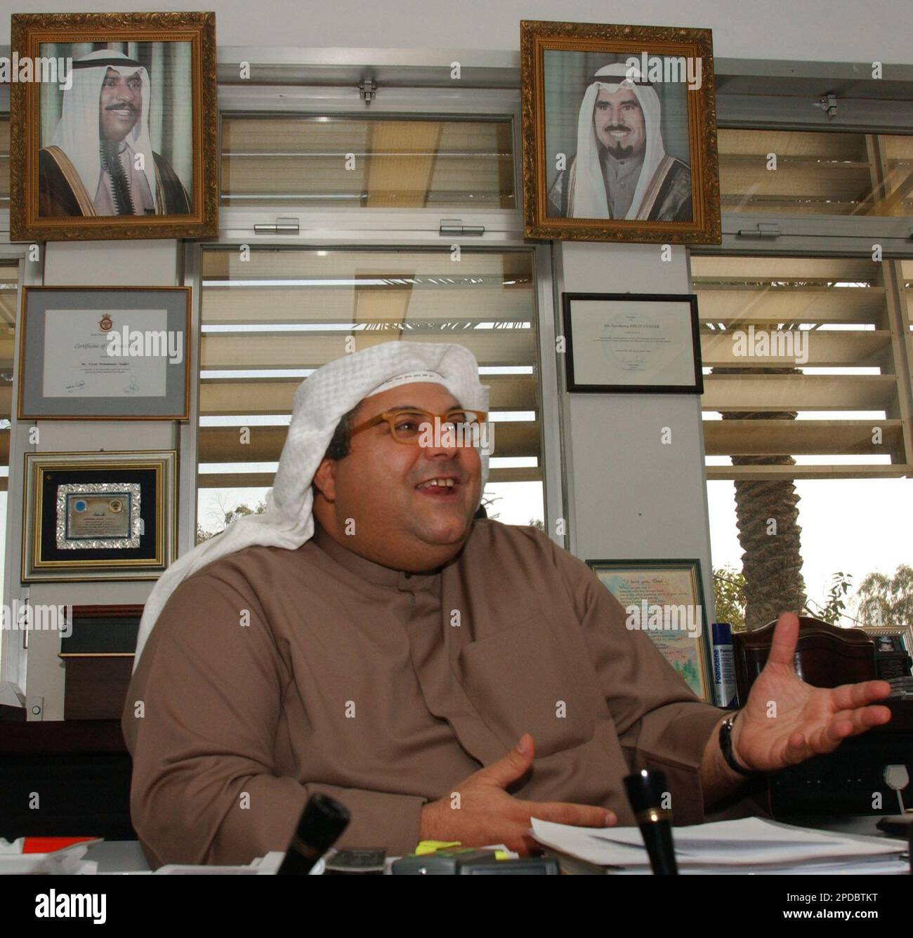 Kuwait Danish Dairy Company Chairman Mohammed Jaffar talks to an AP reporter (not seen) in his ...