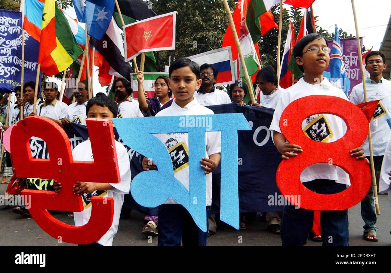 Bangladeshi children hold Bengali letters during an International ...