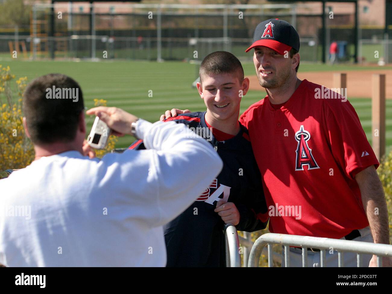 Los Angeles Angels pitcher Scot Shields, right, poses for a photograph ...