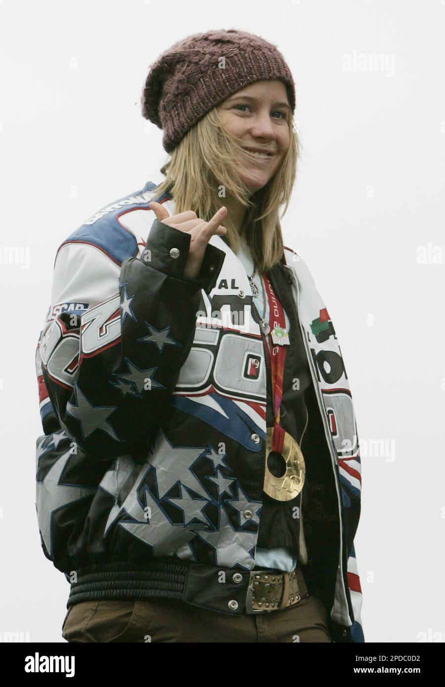 Olympic snowboard gold medalist Hannah Teter reacts as she is ...