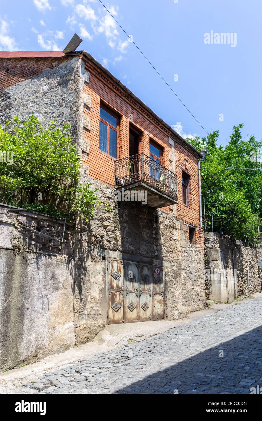 Traditional residential two-storey building in Kutaisi with lathed ...
