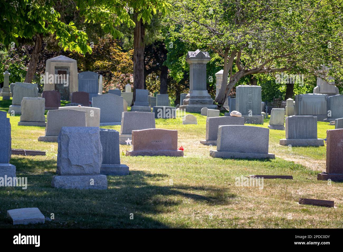 Various headstones and gravestones at a cemetery Stock Photo - Alamy