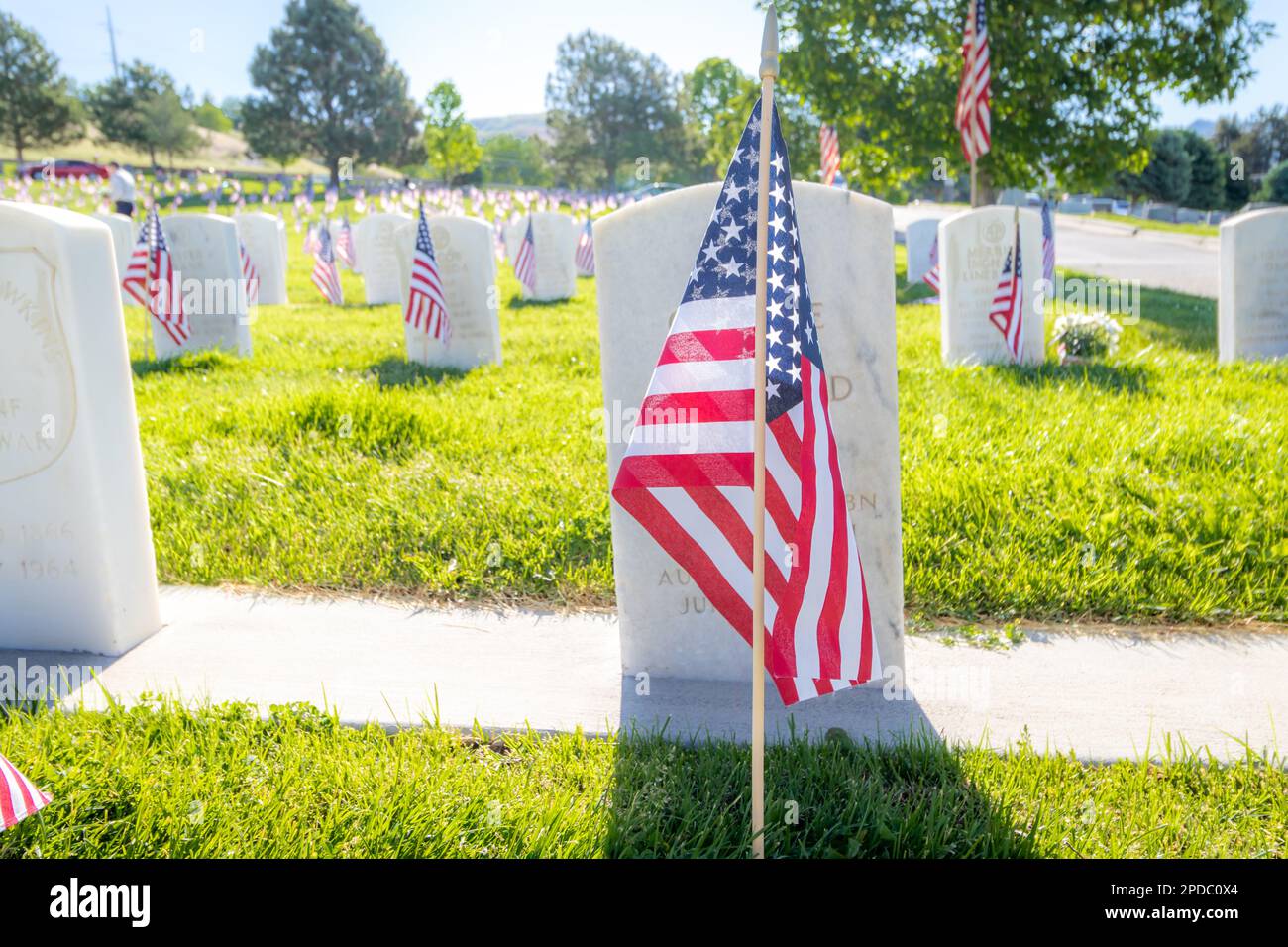 Military headstones honoring armed forces servicemen decorated with ...
