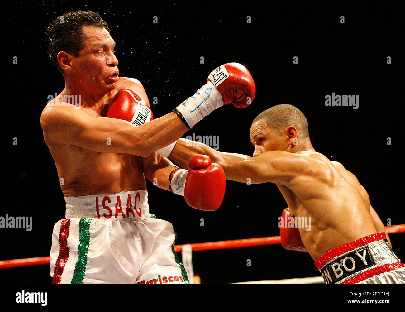 WBO minimum weight champion Ivan Calderon, right, of Puerto Rico, lands ...