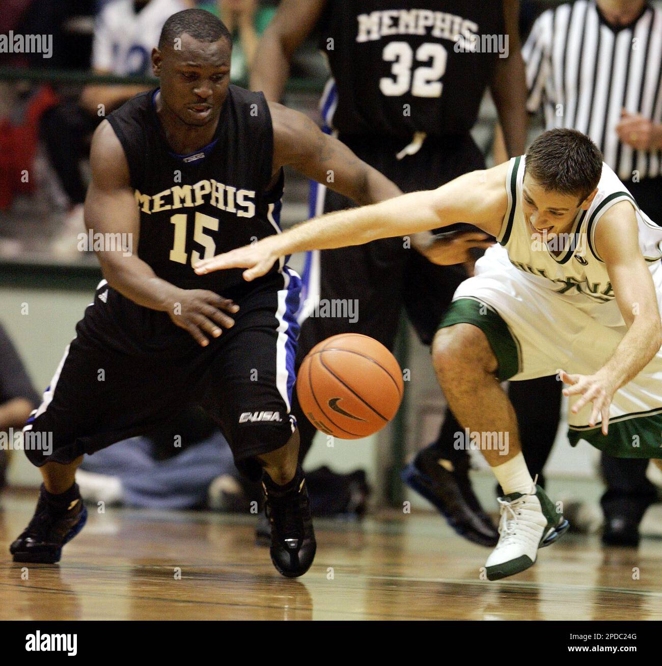 Memphis guard Andre Allen (15) and Tulane guard Andrew Garcia, right ...