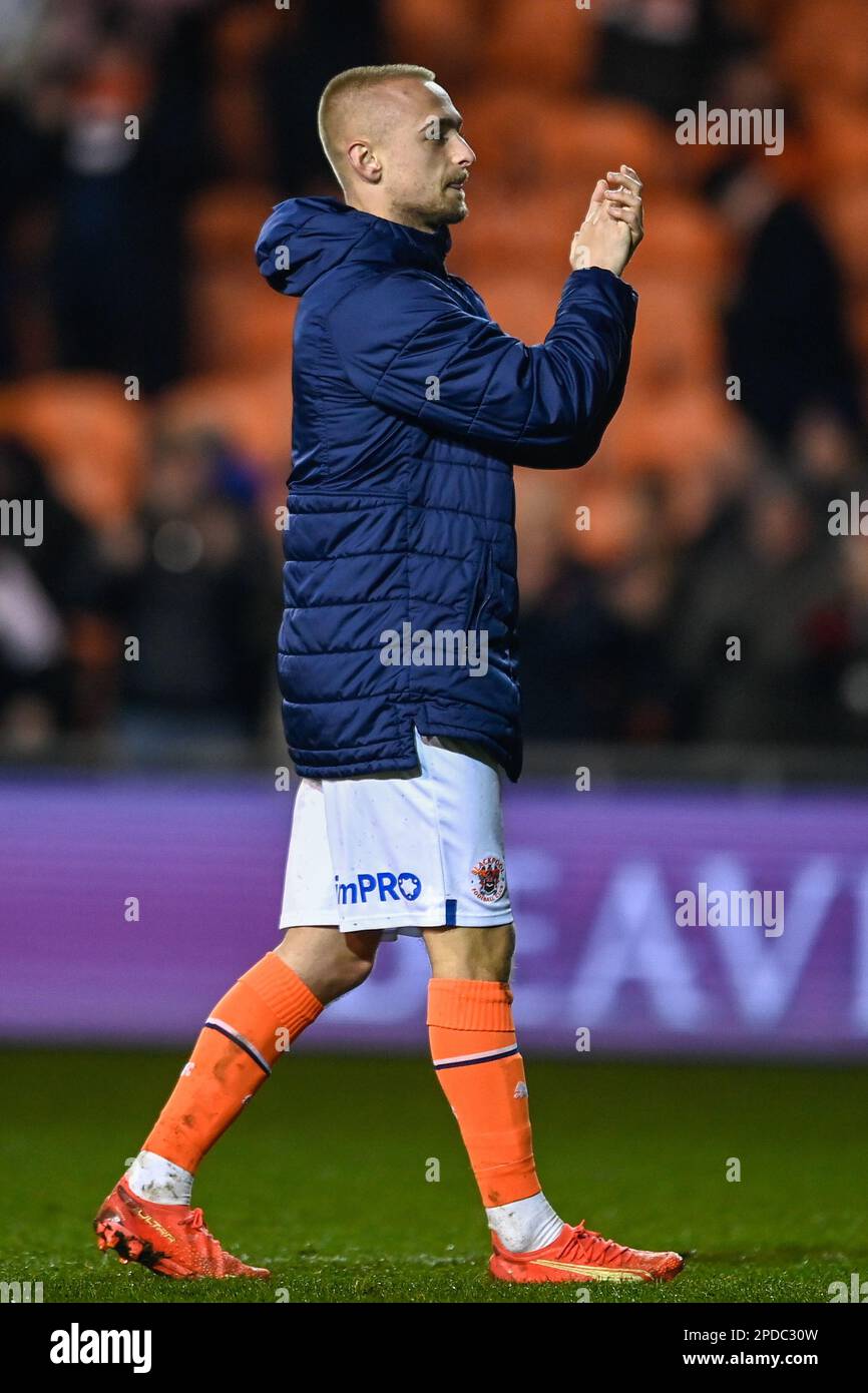 Blackpool, UK. 14th Mar, 2023. Lewis Fiorini #8 of Blackpool applauds ...