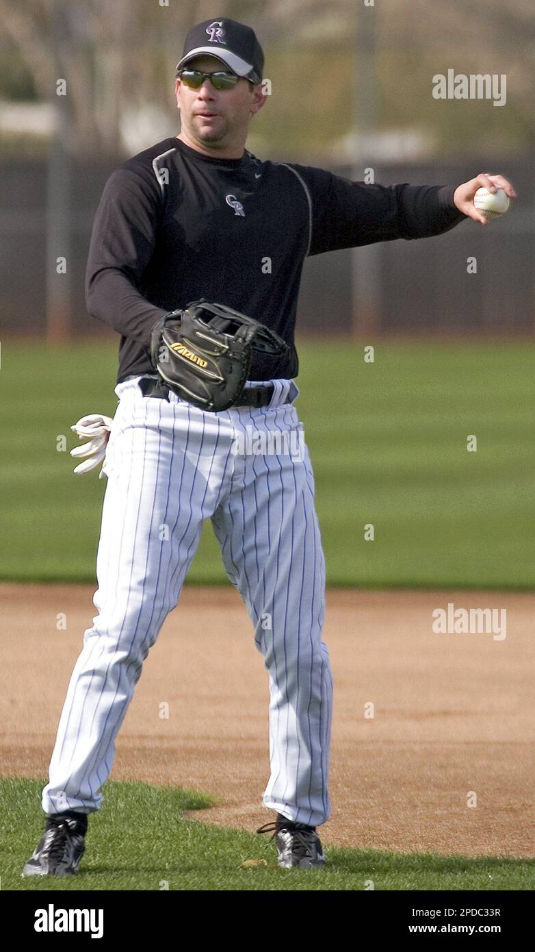 Colorado Rockies first baseman Todd Helton throws the ball back during ...