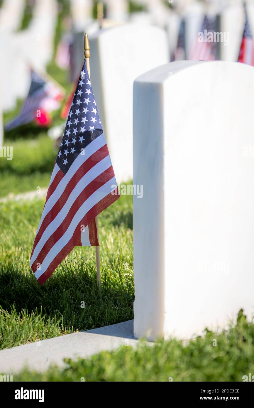 Military headstones honoring armed forces servicemen decorated with ...
