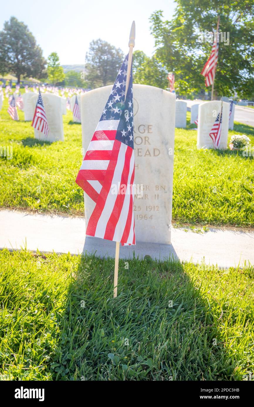 Military headstones honoring armed forces servicemen decorated with ...