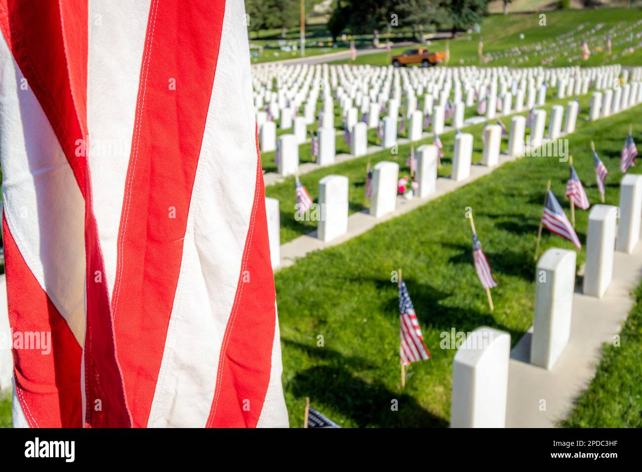 Military headstones honoring armed forces servicemen decorated with ...