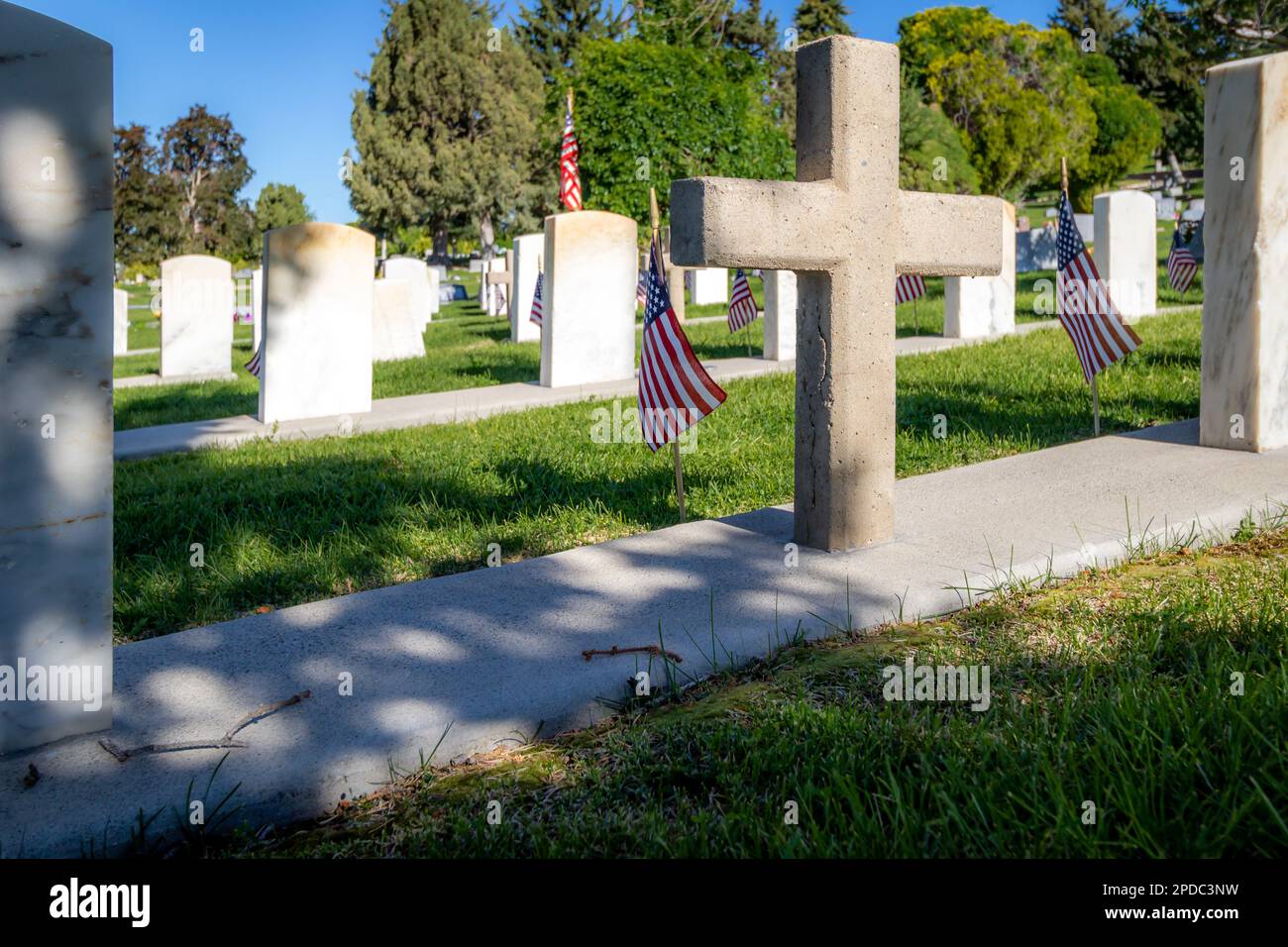 Military headstones honoring armed forces servicemen decorated with ...
