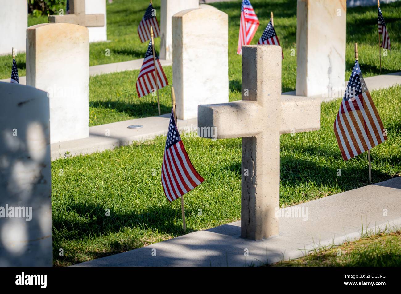 Military headstones honoring armed forces servicemen decorated with ...