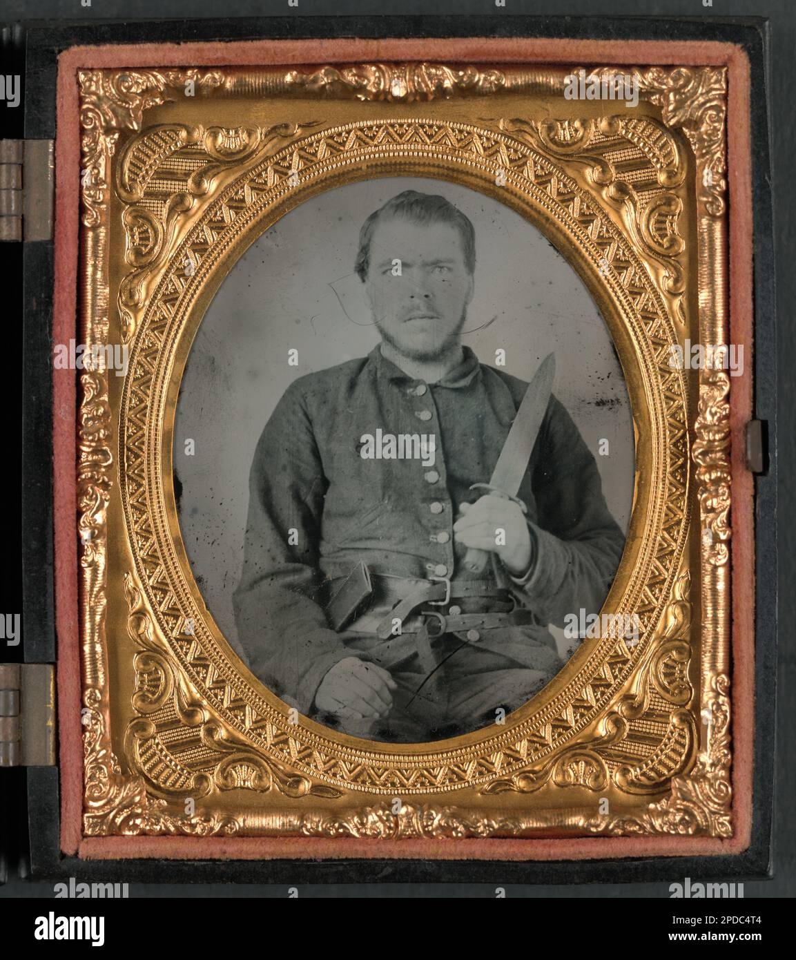Unidentified soldier in Georgia Confederate uniform and double roller ...