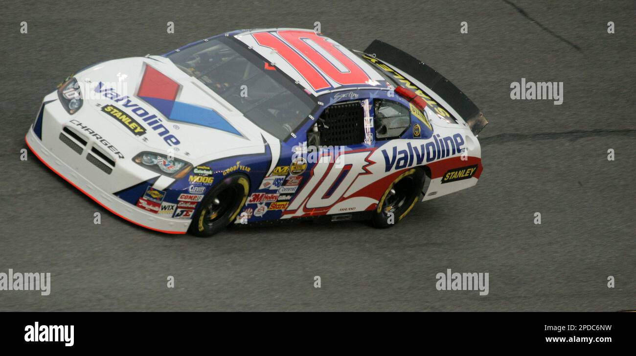 NASCAR driver Scott Riggs (10) races through Turn 4 during the Gatorade ...