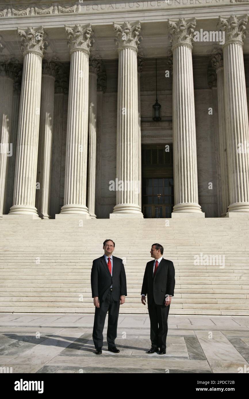 Supreme Court Justice Samuel Alito, left, is escorted by Chief Justice ...