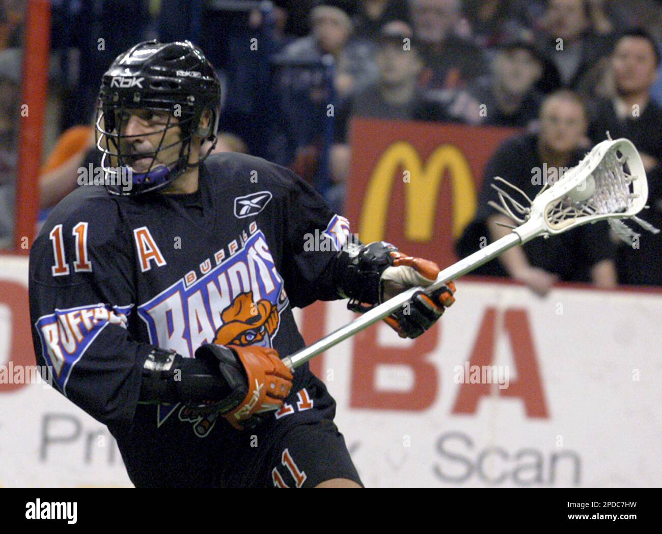 Buffalo Bandits lacrosse player John Tavares looks to shoot on net ...