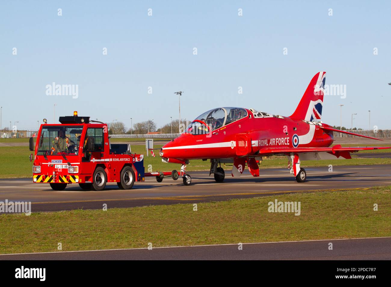 RAF Red Arrow being towed at RAF Waddington Stock Photo - Alamy