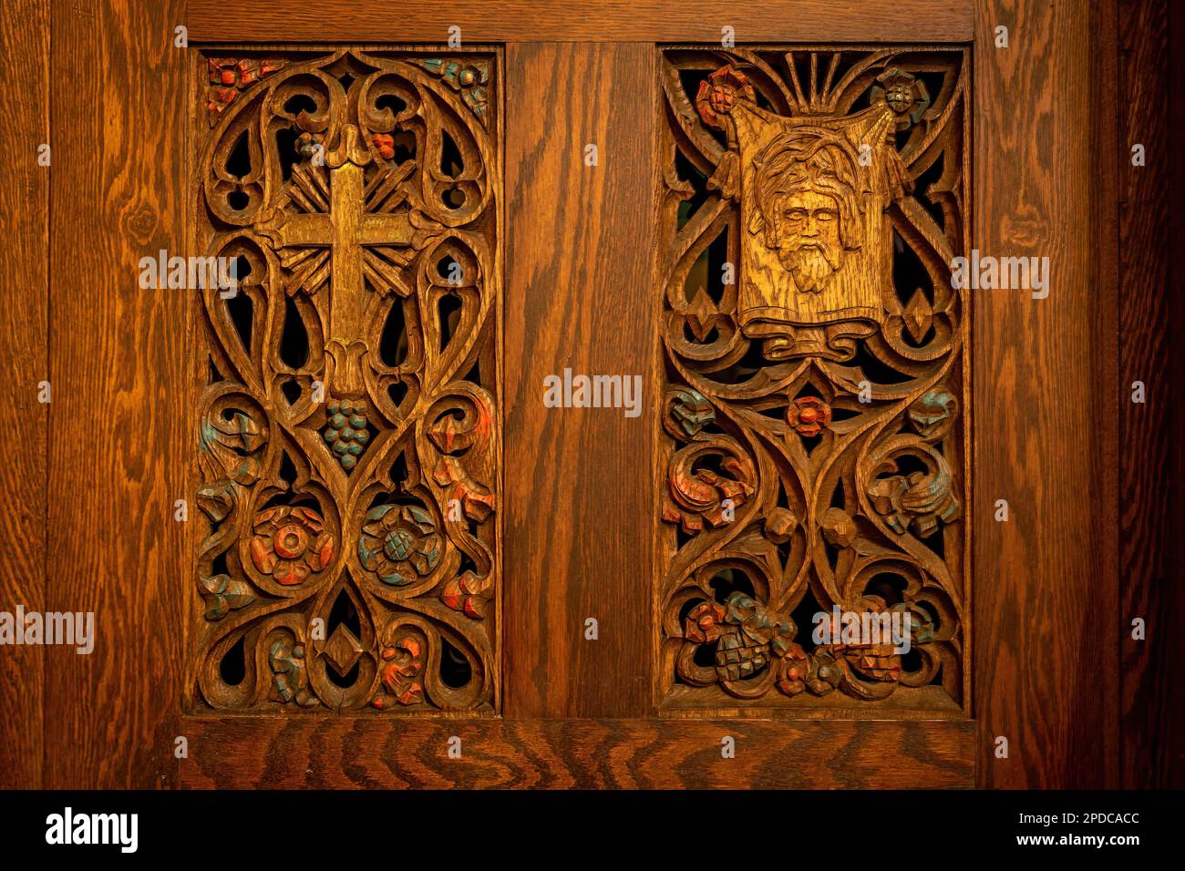 Decorative carving of Jesus Christ on the door of a Catholic cathedral ...
