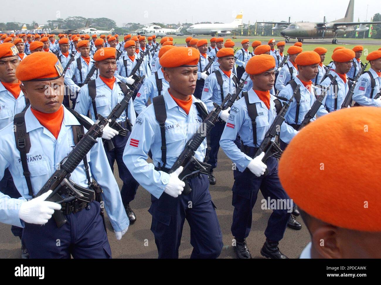 Indonesia air force soldiers march after the hand over ceremony ...