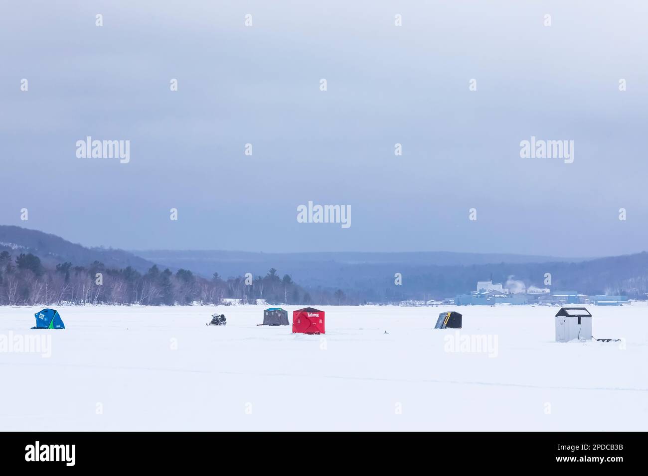 Ice fishing on Munising Bay off Sand Point in Pictured Rocks National ...