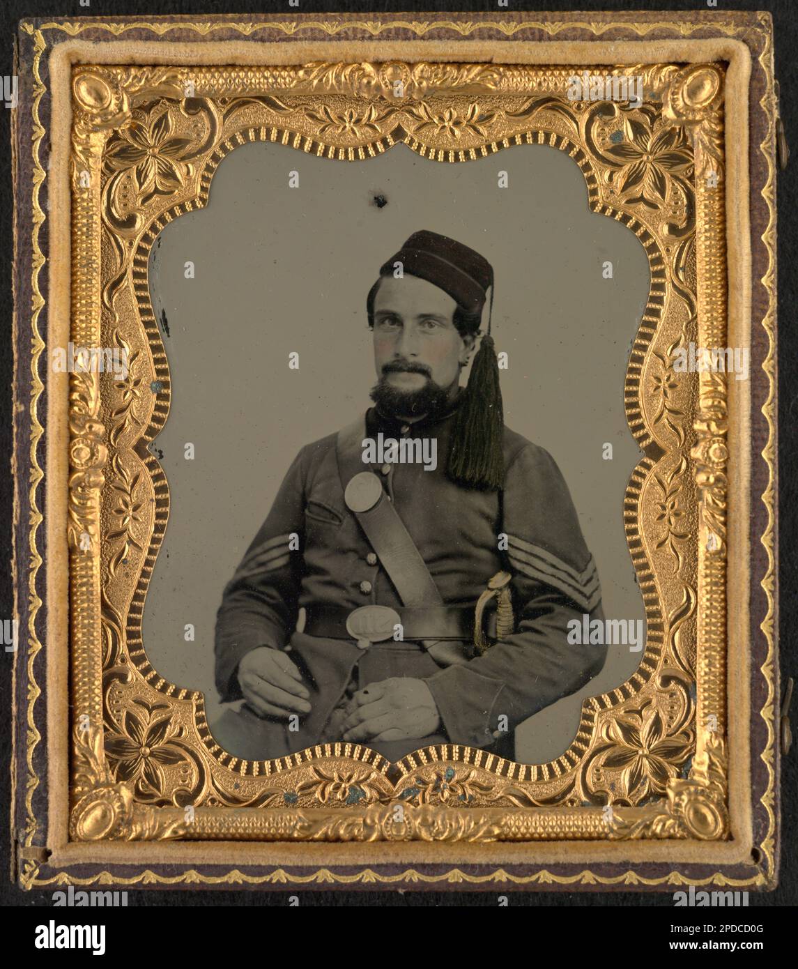 Unidentified soldier in Union uniform and smoking fez with sword ...