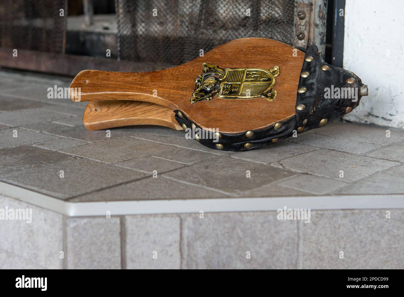 Hand blower with copper inlay for fireplace Stock Photo - Alamy