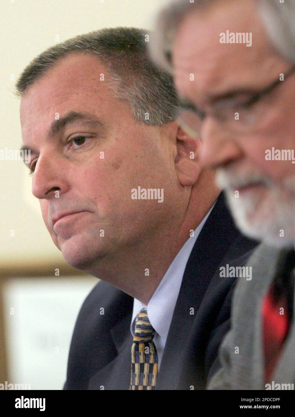Coin dealer Tom Noe, left, looks on during his court hearing at the ...