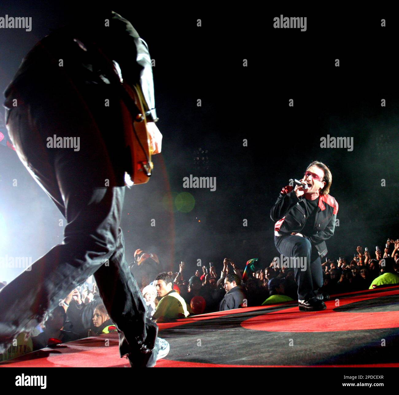 U2's lead singer Bono, and guitarist The Edge perform during the ...