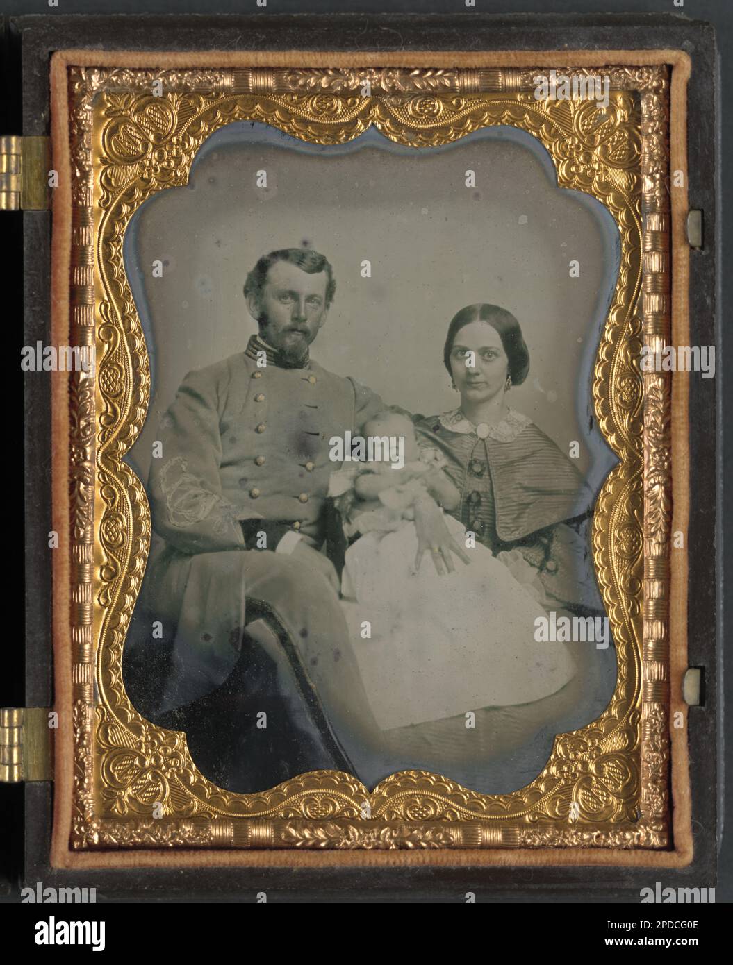 Unidentified officer in Confederate uniform with wife and baby ...