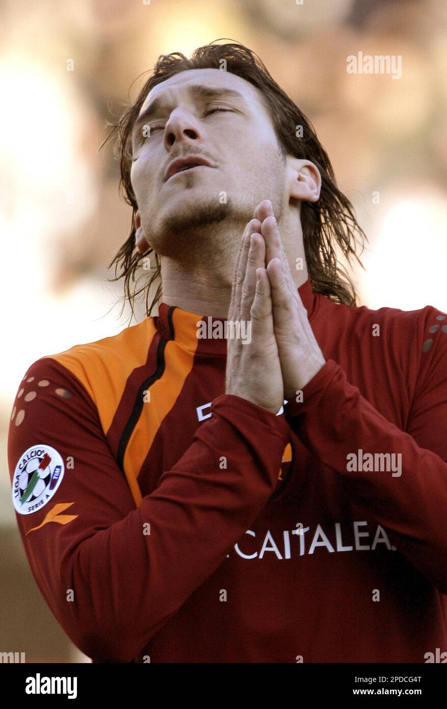 AS Roma's star Francesco Totti reacts after missing a chance to score ...