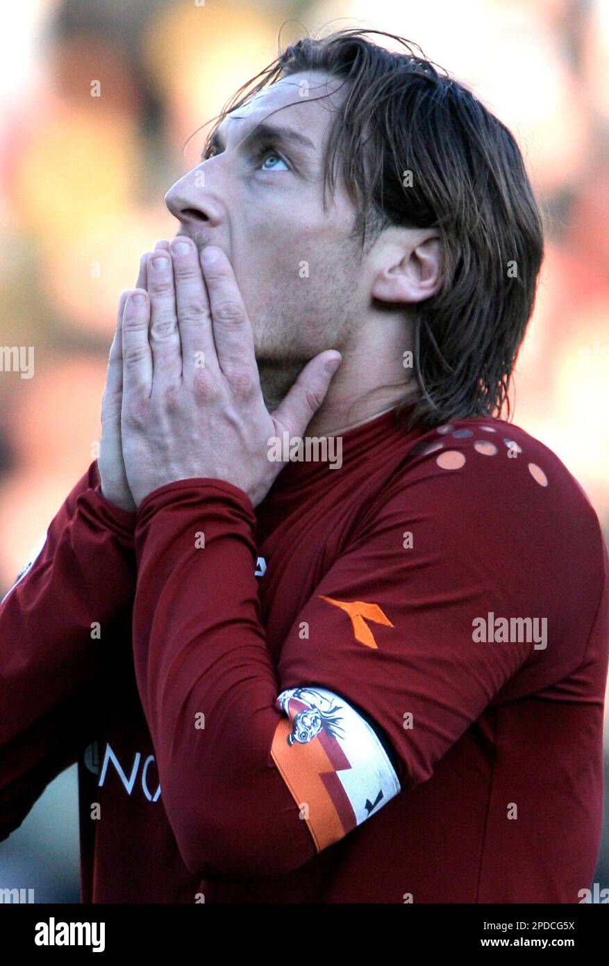 AS Roma's star Francesco Totti reacts after missing to score during the ...