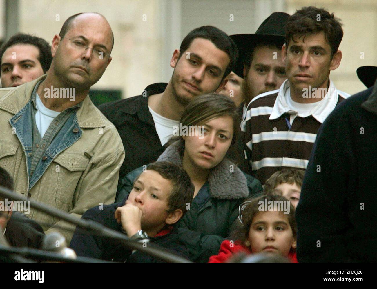 Bystanders look on as Dr. Shlomo Mor-Yosef, director of Hadassah ...