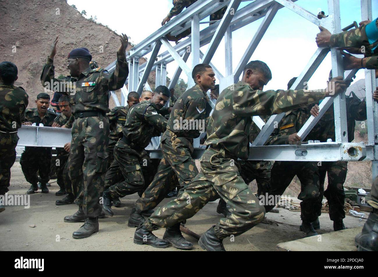 Indian Army soldiers work on the Kaman Post Bridge on the Line of ...