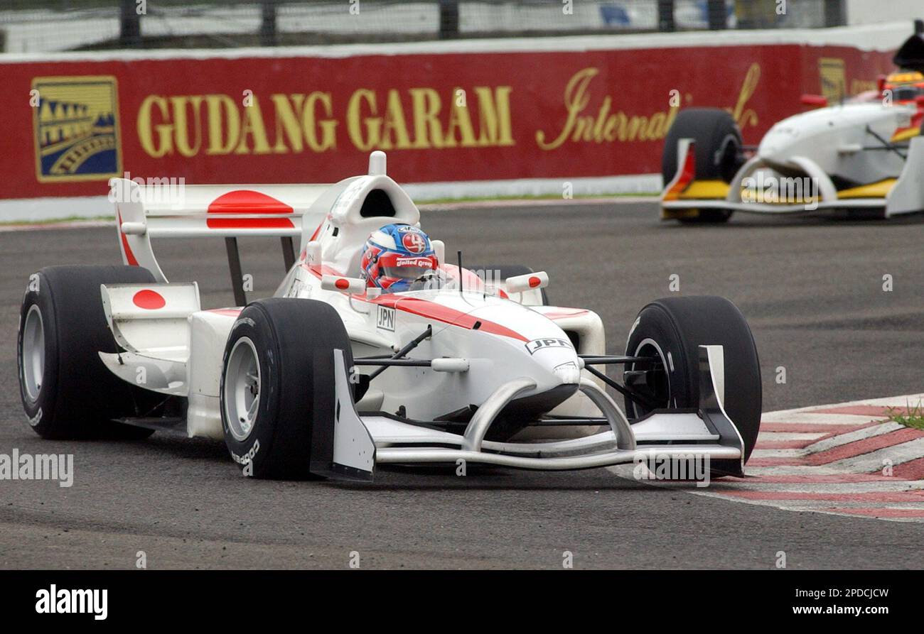 Hayanari Shimoda from A1 Japan team steers his car during a qualifying ...