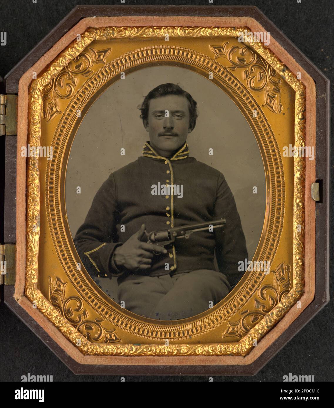 Unidentified soldier in Union uniform with revolver. Liljenquist Family ...