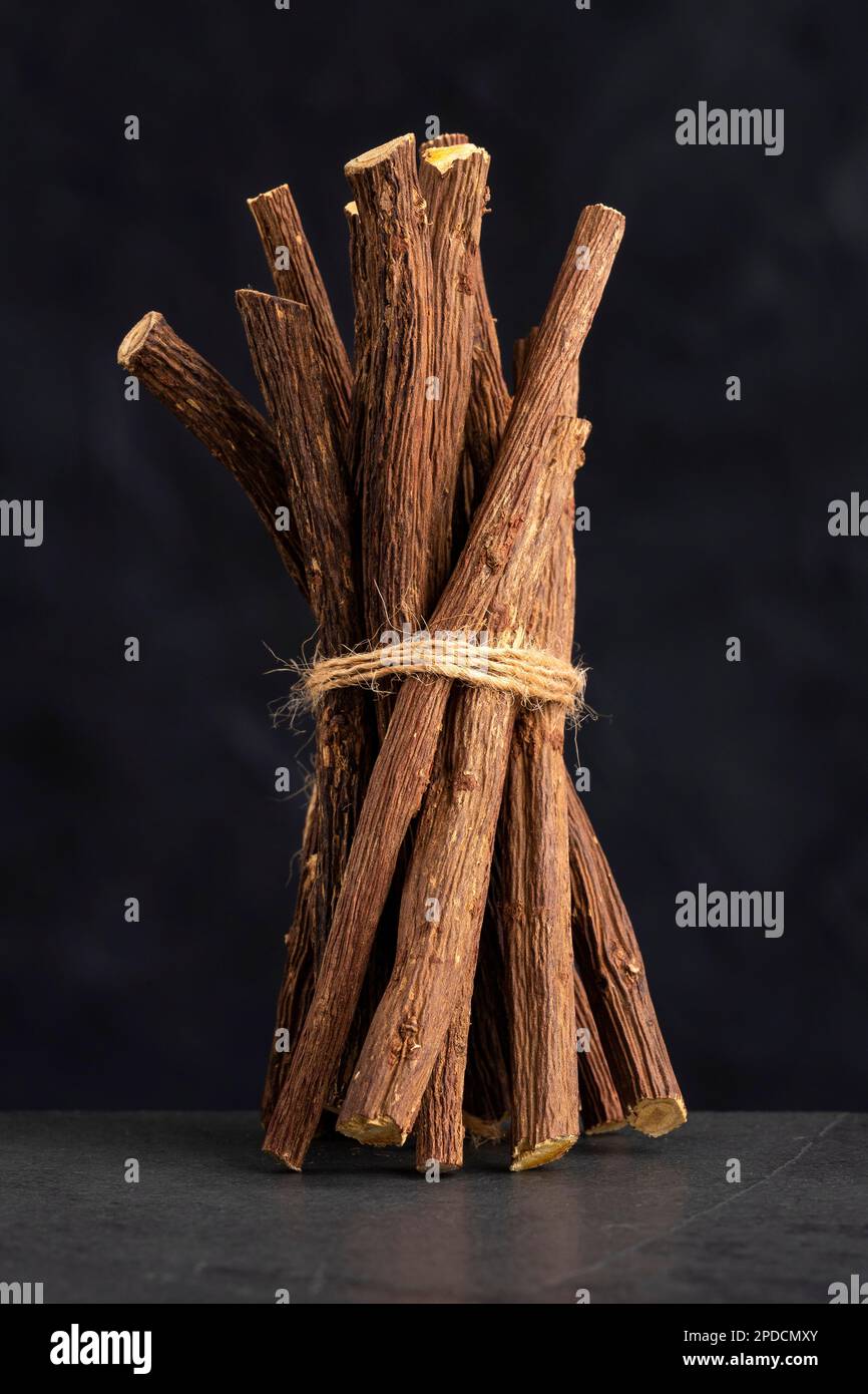Glycyrrhiza glabra - Dried organic licorice sticks Stock Photo - Alamy