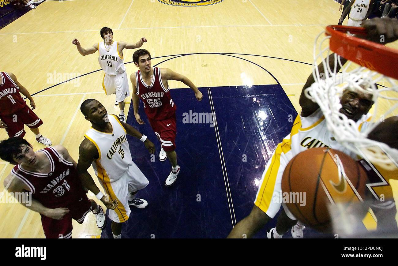 California's Leon Powe, right, dunks as Stanford's Taj Finger (31 ...